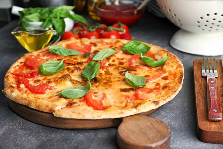 How Many Slices Are in a 14-inch Pizza? - HowdyKitchen