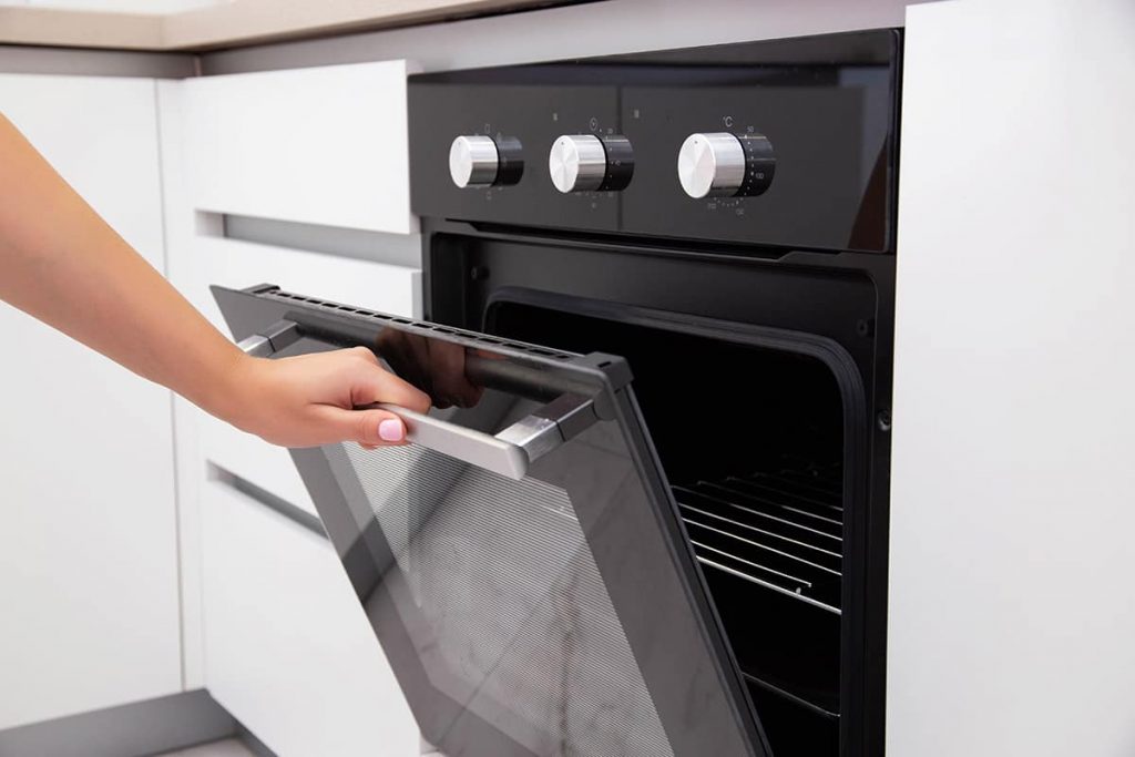 Should You Self Clean a New Oven? - HowdyKitchen
